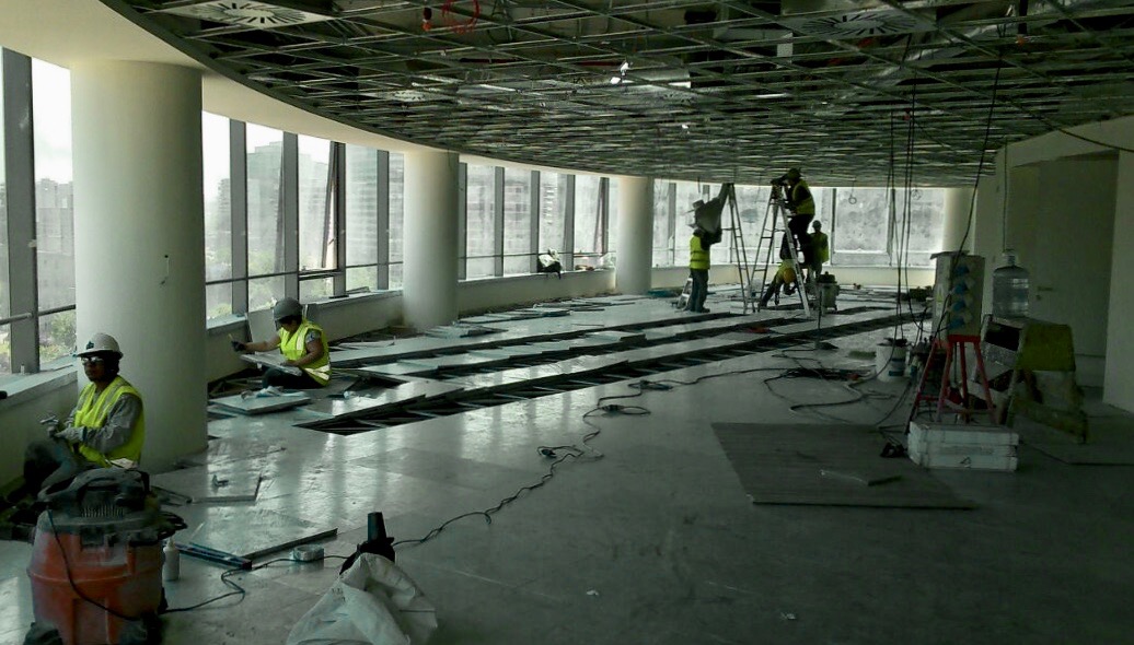 TORRE TITANIUM - CHILE 16.000 MQ - Suelos técnicos para interiores y ...